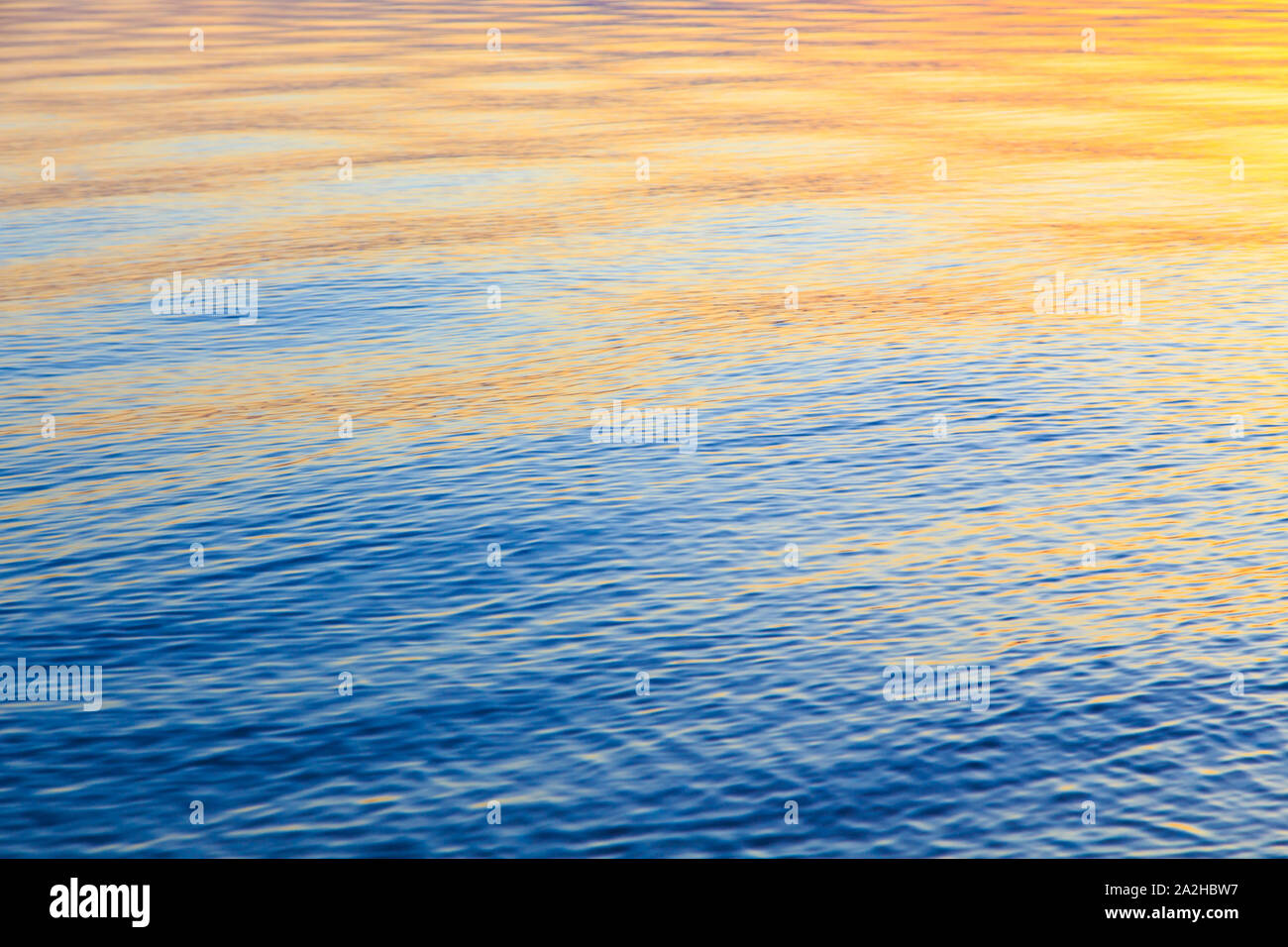 Clear water texture in blue and orange. Background of the ocean and the ...