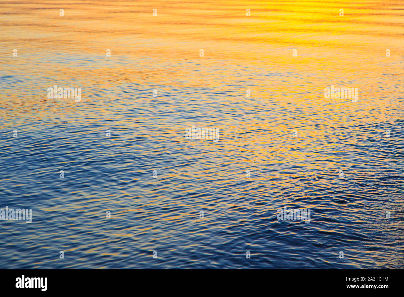 Clear water texture in blue and orange. Background of the ocean and the ...