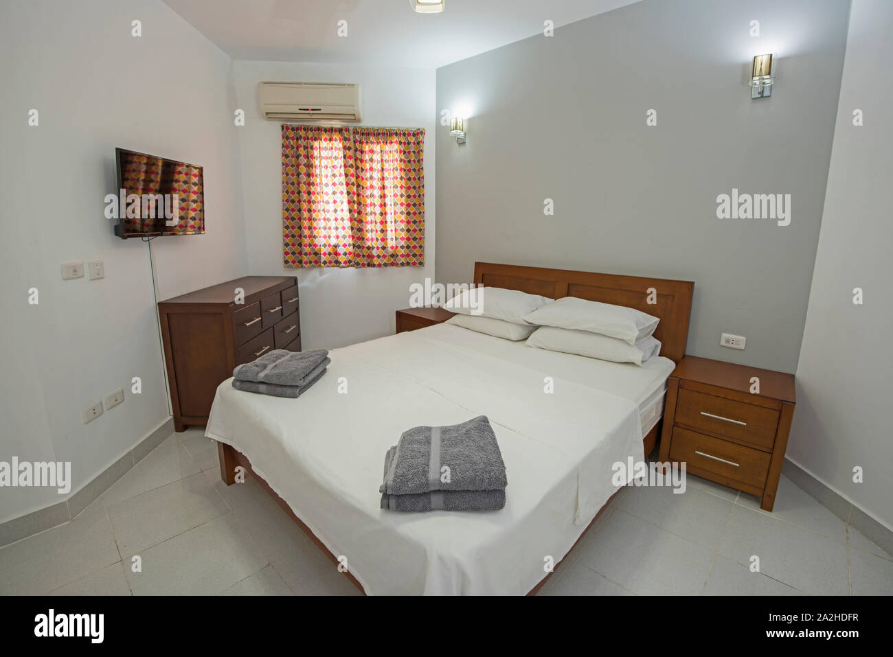 Interior design decor furnishing of luxury show home bedroom with ...