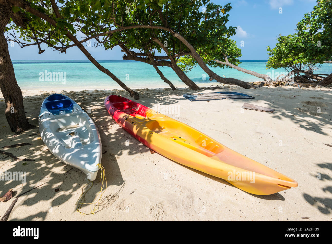 Colorful Kayaks on the sandy beach of the Maldives. Paradise tropical ...