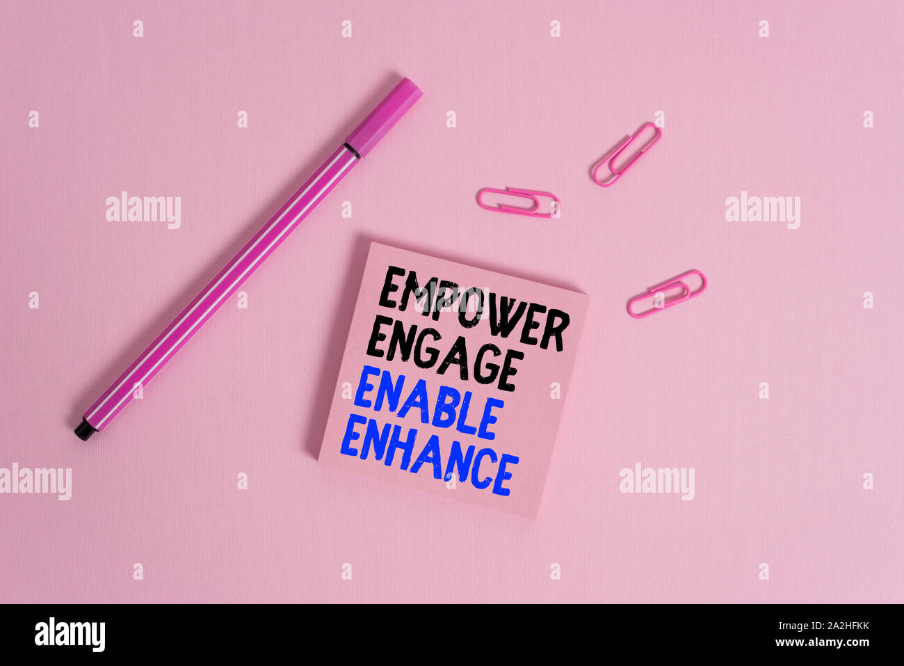 Writing note showing Empower Engage Enable Enhance. Business concept ...