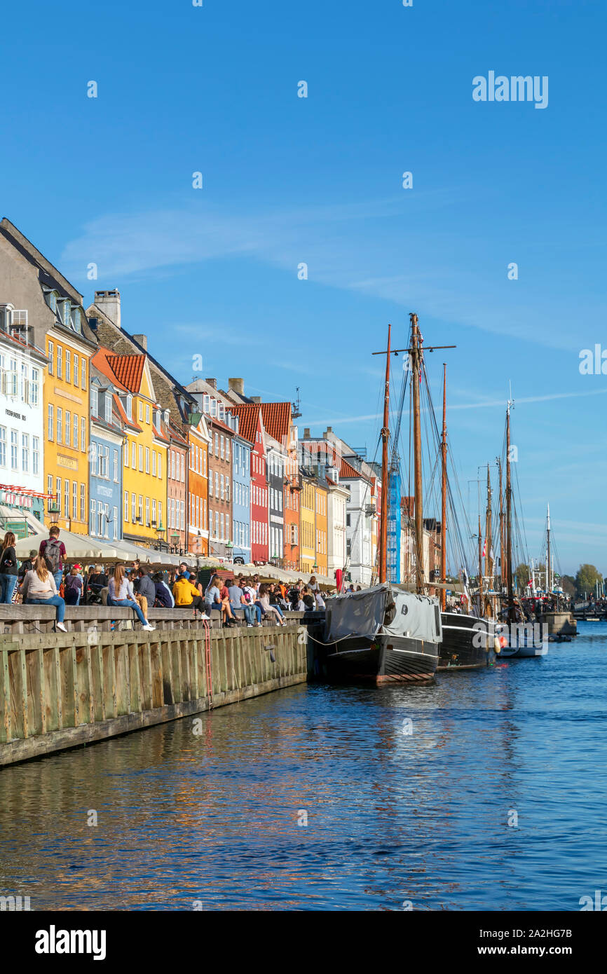 Nyhavn waterfront with colorful houses, canal and entertainment ...