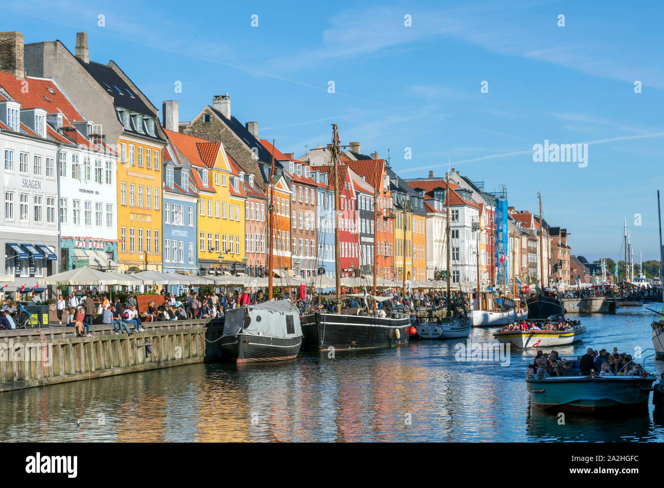 Nyhavn waterfront with colorful houses, canal and entertainment ...