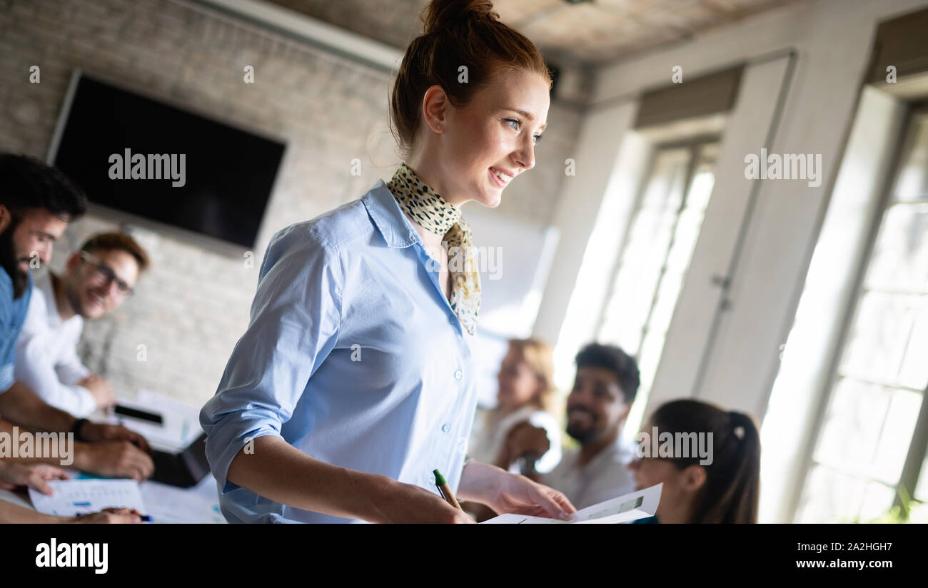 Happy creative team in office. Business, startup, design, people and ...