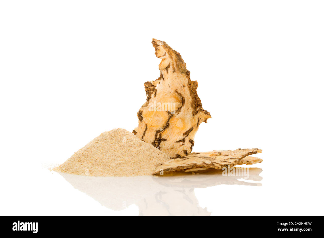 Angelica root slices and powder isolated on white background. Medicinal ...