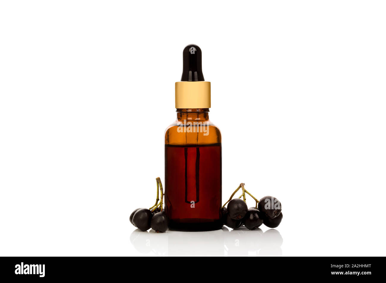 Bottle of chokeberry extract isolated on white background Stock Photo ...