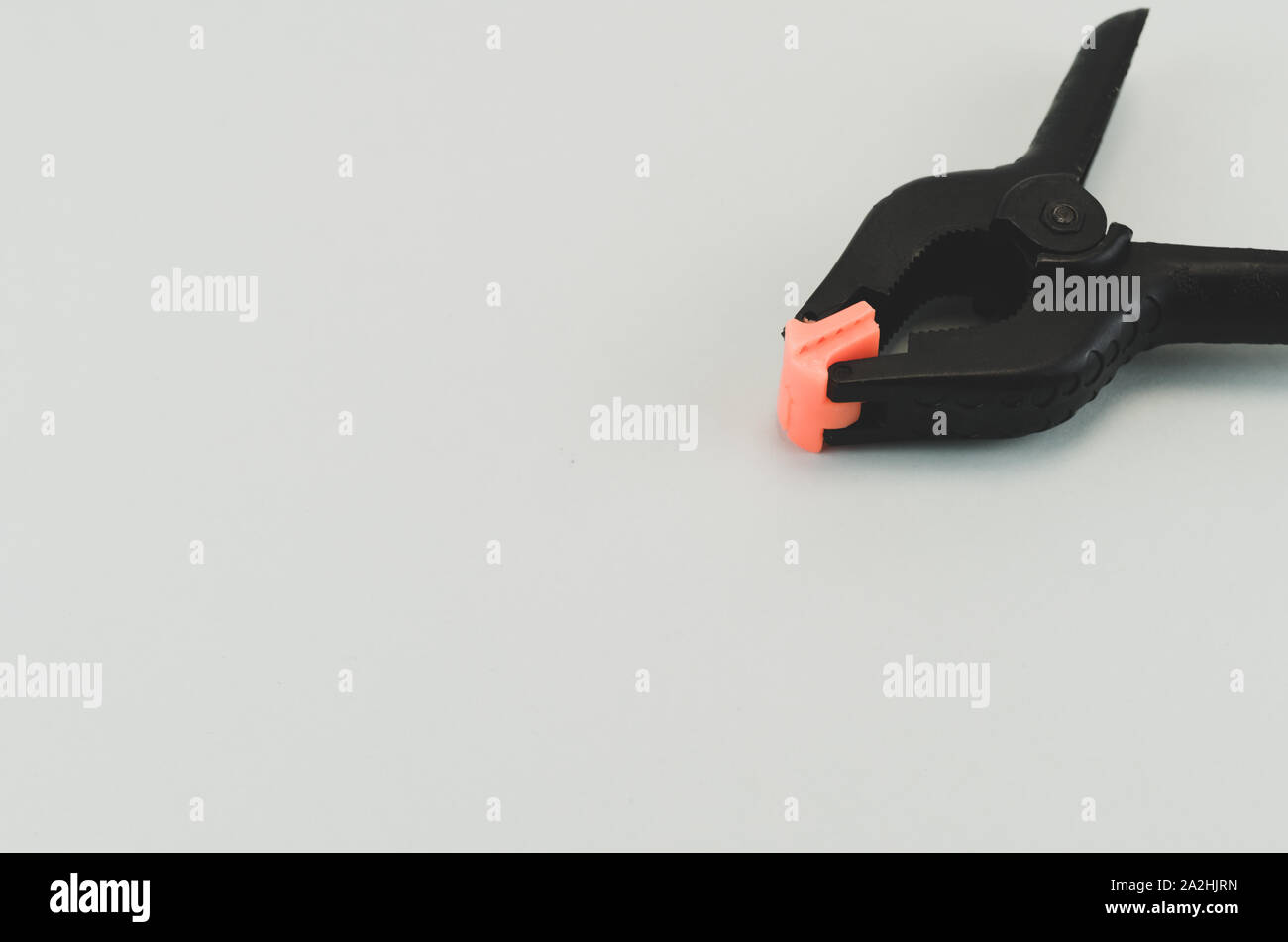 objects and work tools - plastic spring clamp Stock Photo - Alamy