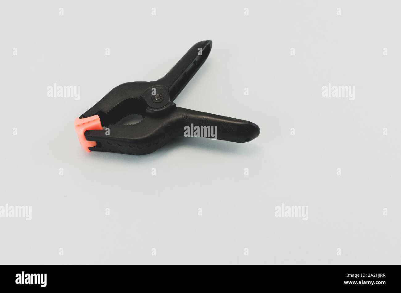 objects and work tools - plastic spring clamp Stock Photo - Alamy