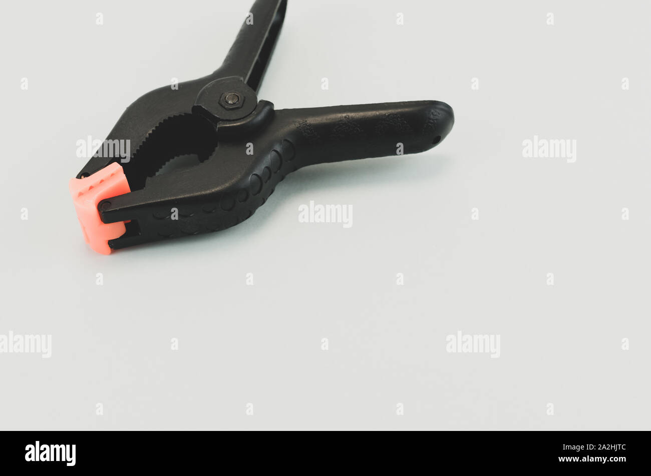 objects and work tools - plastic spring clamp Stock Photo - Alamy