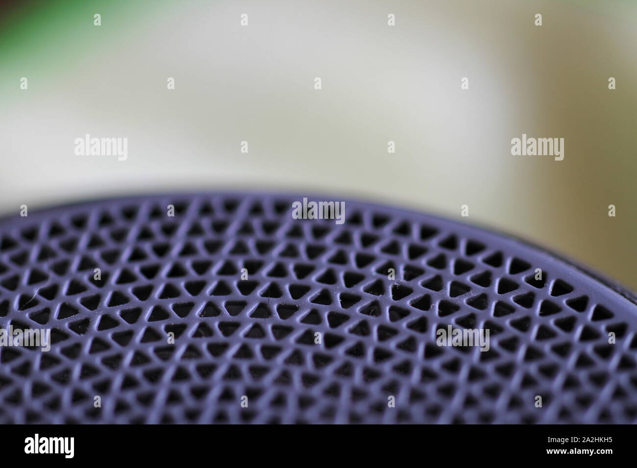 Perforated surface of triangles and lines Stock Photo - Alamy