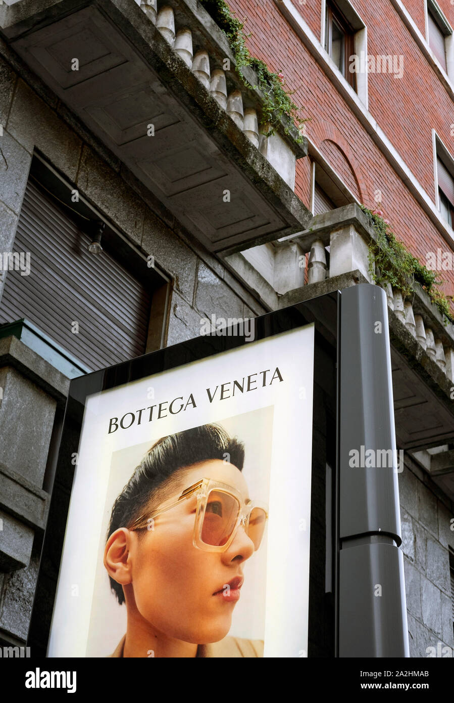 Milan, Italy, august 2019. Bottega Veneta commercial billboard ...