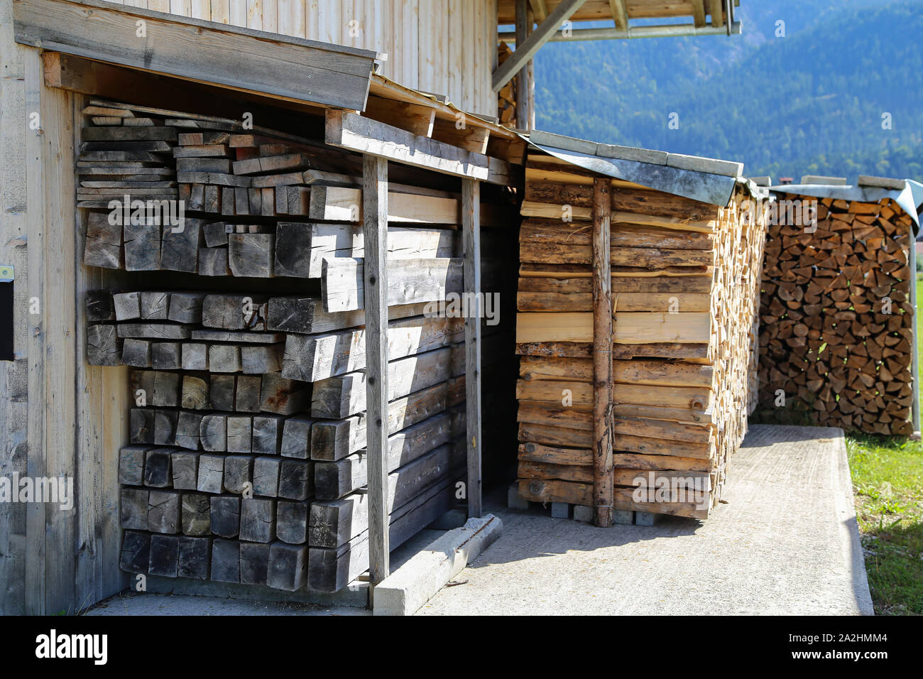 Firewood stacked under house hi-res stock photography and images - Alamy