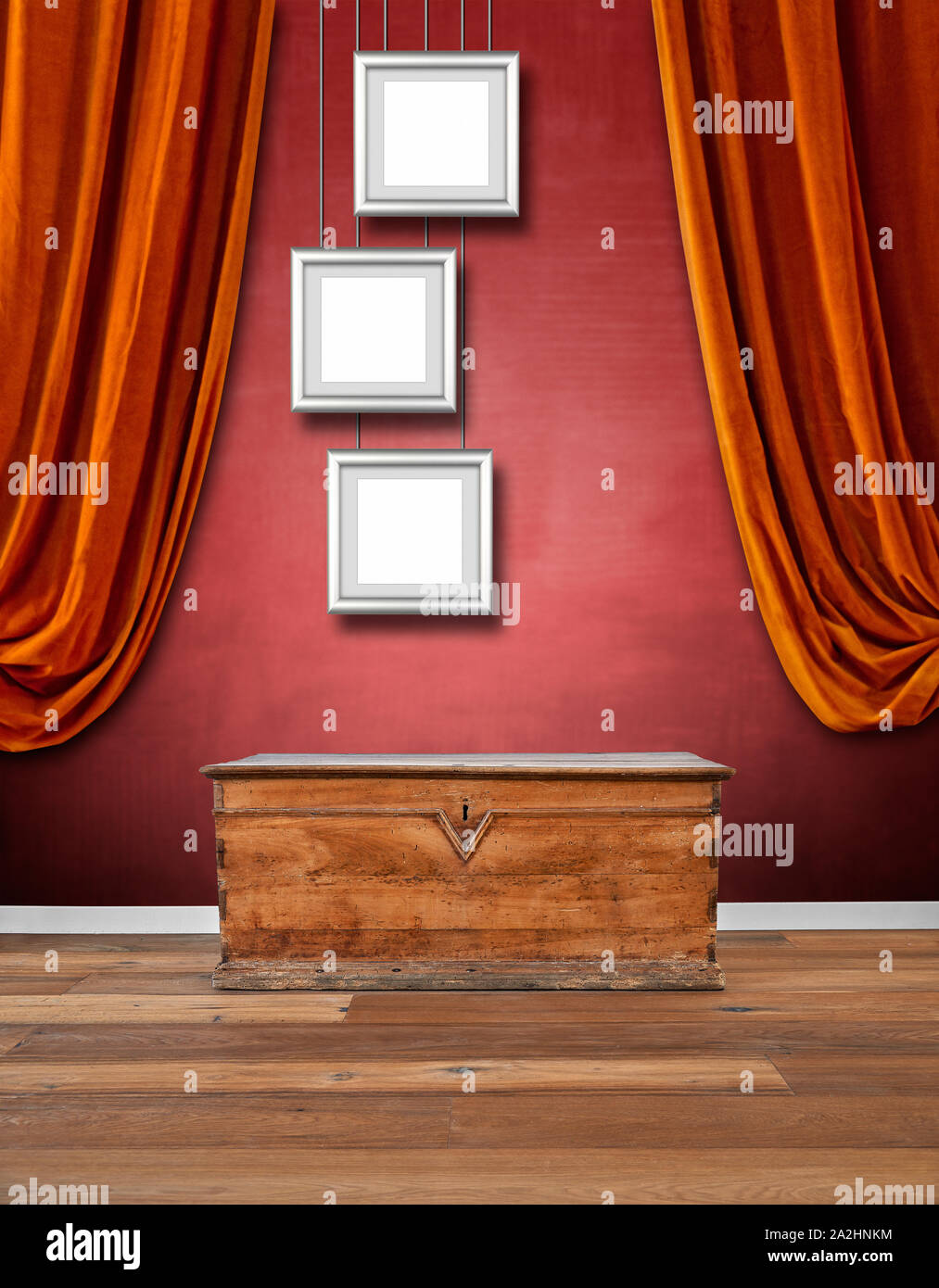 Modern interior with old wooden chest against red textured wall Stock ...