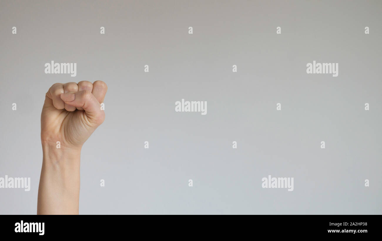 Business woman's hand with thumb up gesture, closeup Stock Photo - Alamy