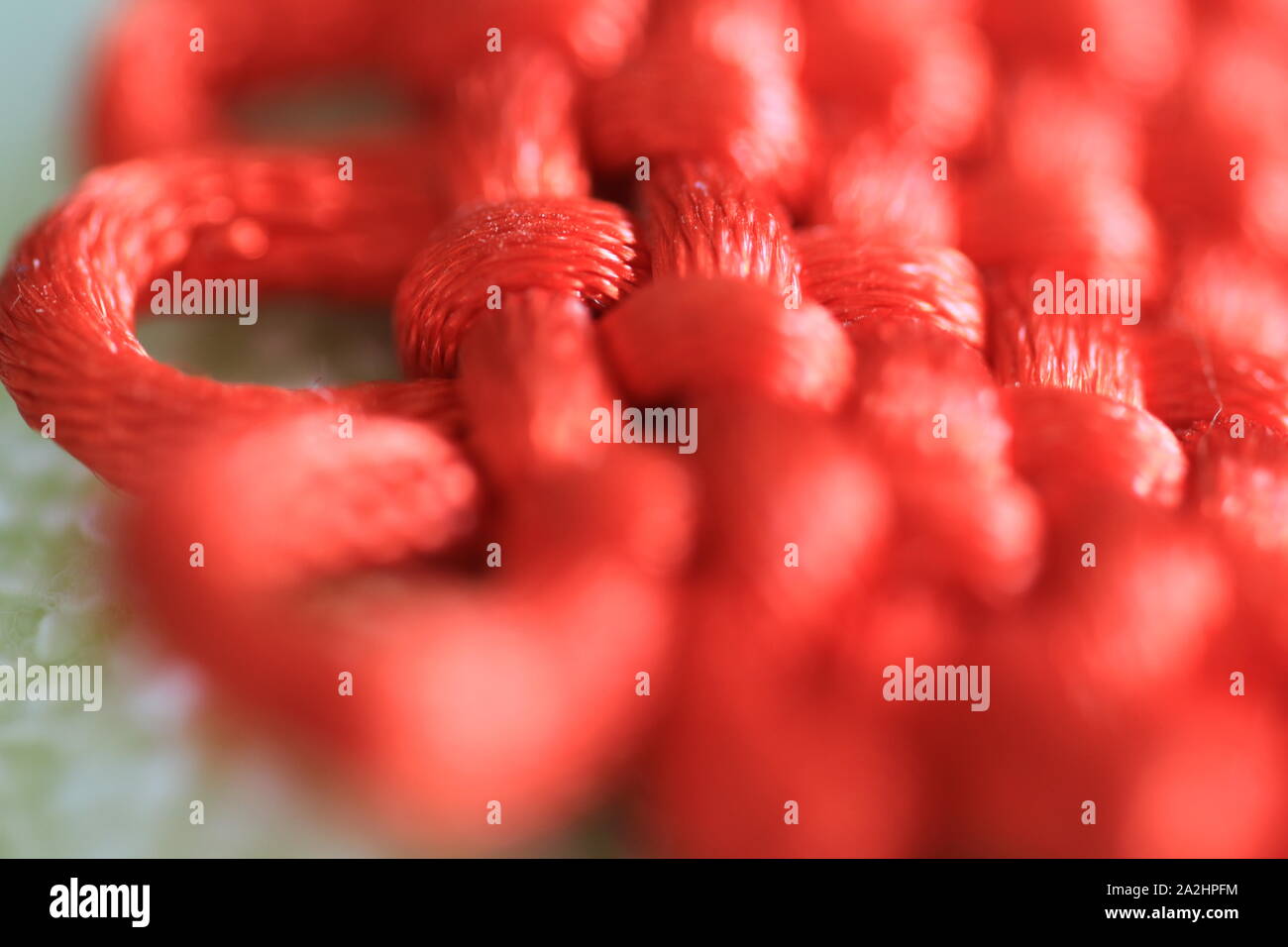 Red chinese style knots for good luck charms Stock Photo - Alamy