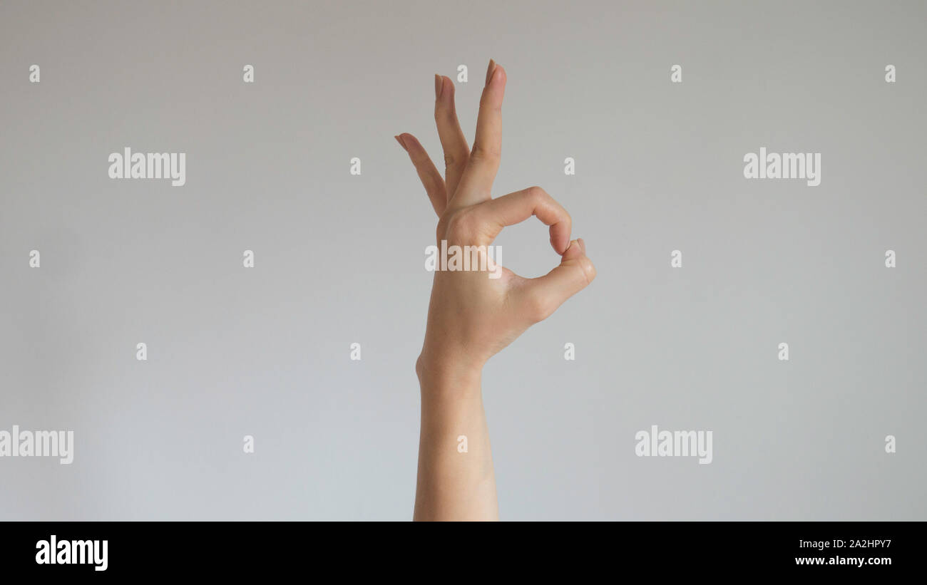 Girl ok hand sign hi-res stock photography and images - Alamy