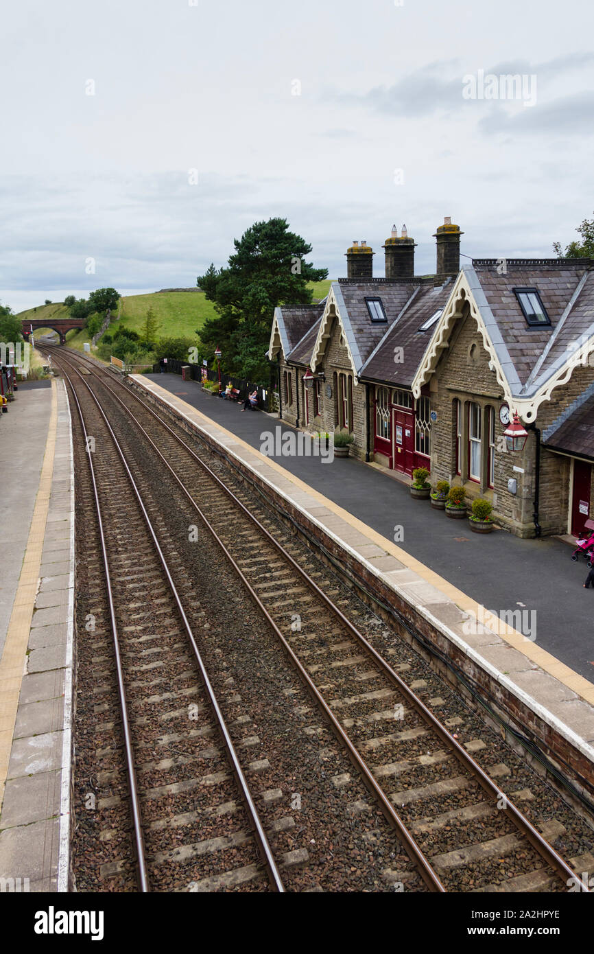 The railway station at Kirkby Stephen in Cumbria on a dull, cloudy day, looking in the ...