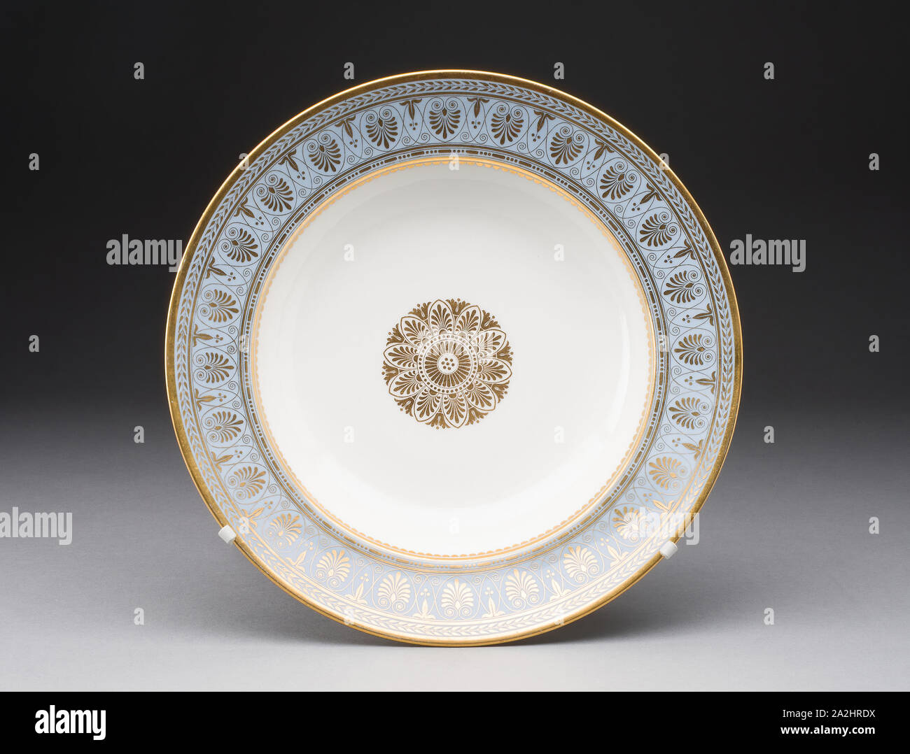 Hard paste porcelain with light blue border and gilded decoration hi ...