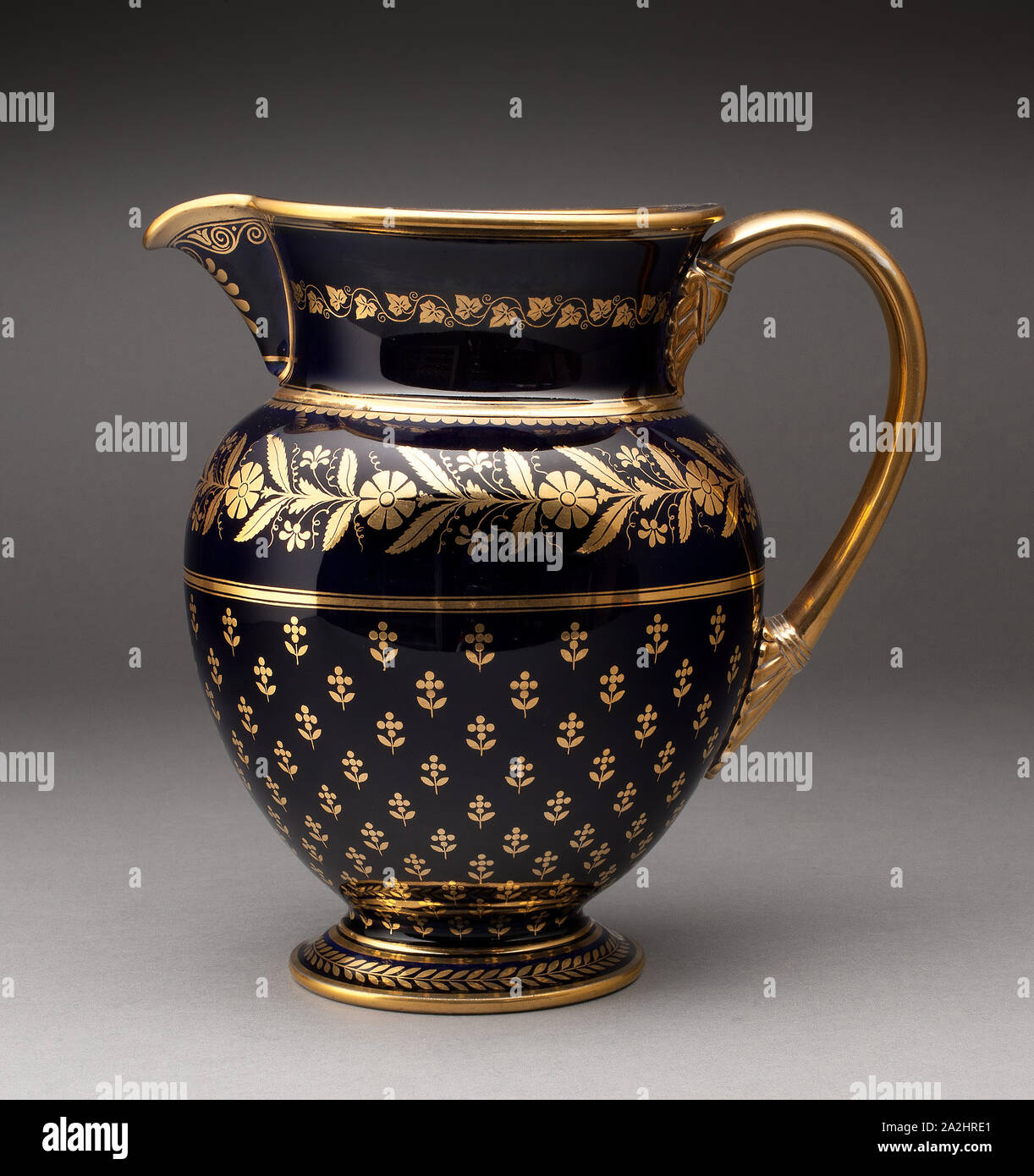 Hard paste porcelain with dark blue ground and gilding hi-res stock ...