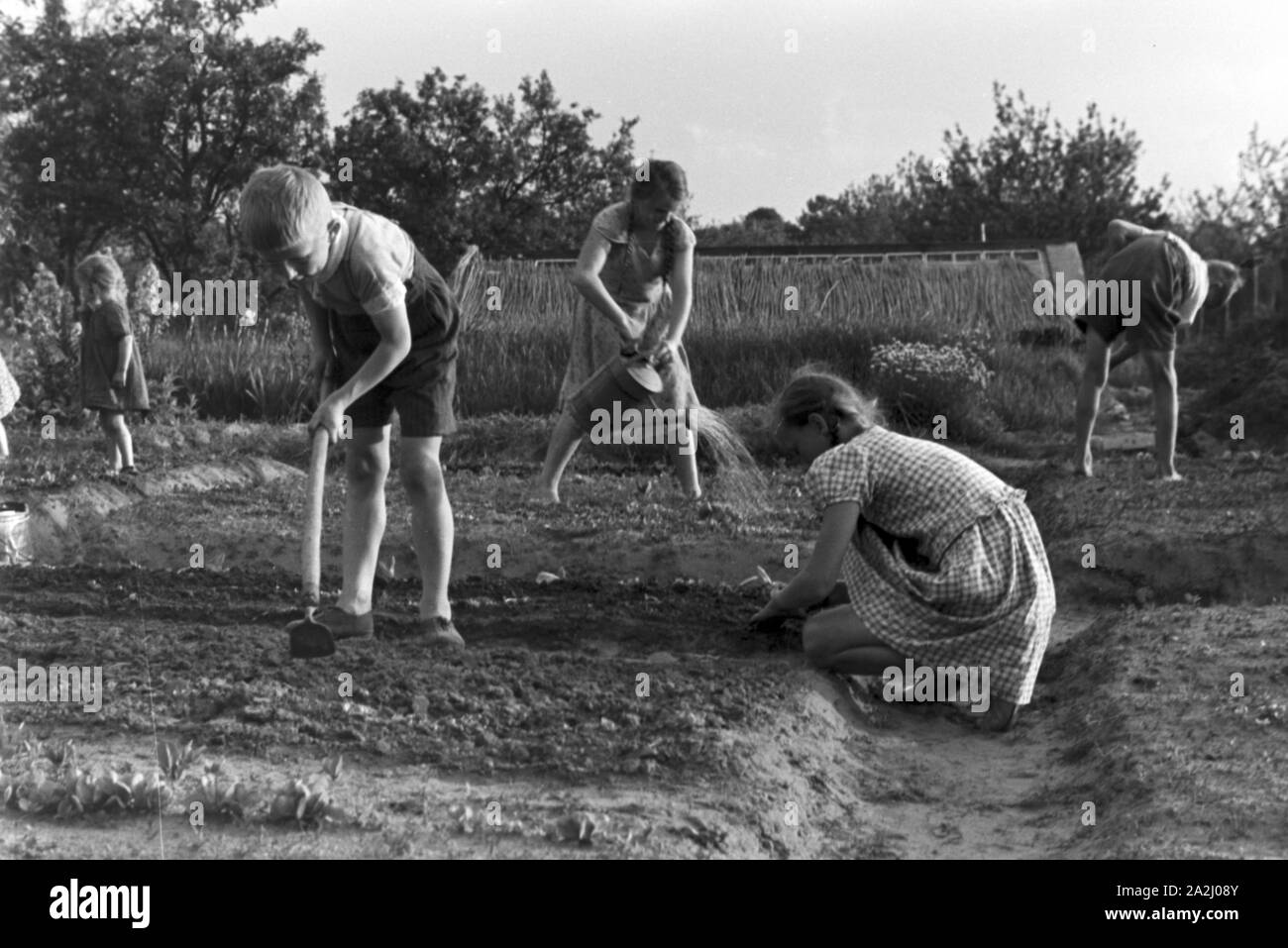Kids school garden outside teacher hi-res stock photography and images ...