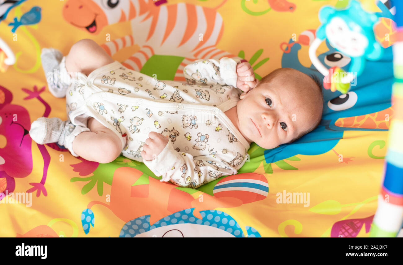 Baby boy sleeping and smiling hi-res stock photography and images - Alamy