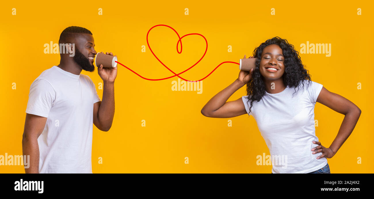 Girl Listening Man Through Cup High Resolution Stock Photography and ...