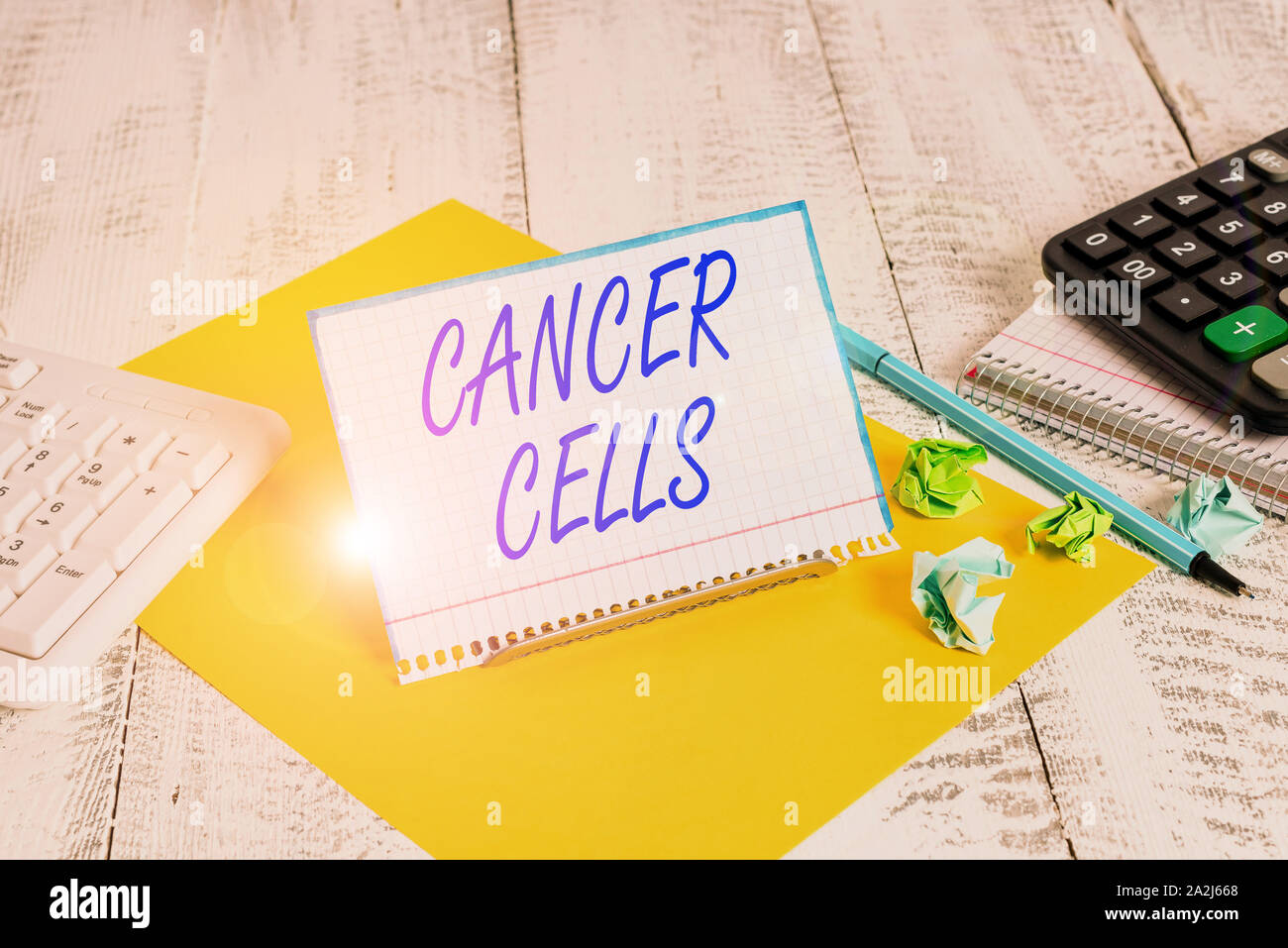Handwriting text writing Cancer Cells. Conceptual photo forming solid ...
