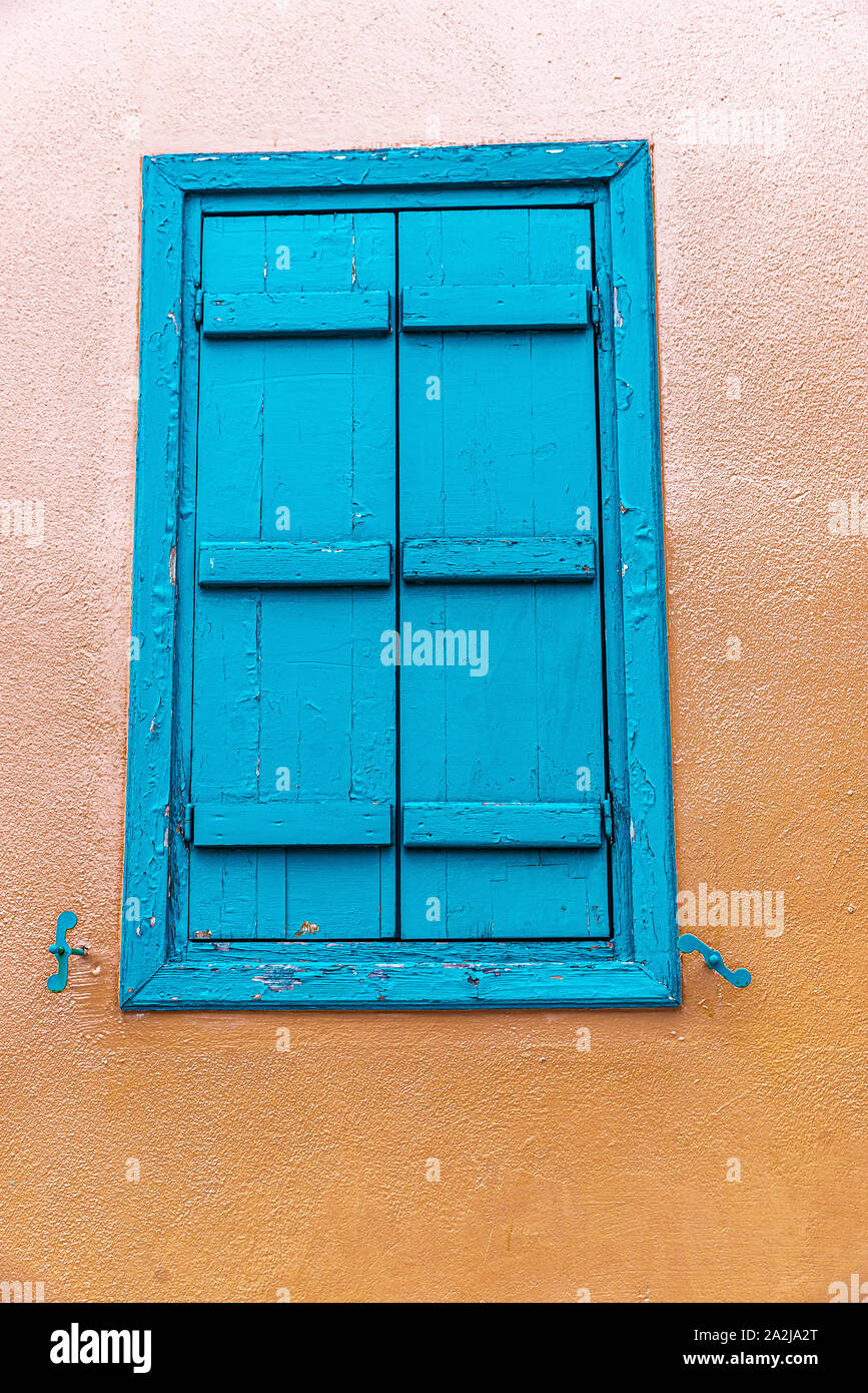 Old blue closed window as background of the Plaka neighborhood of ...