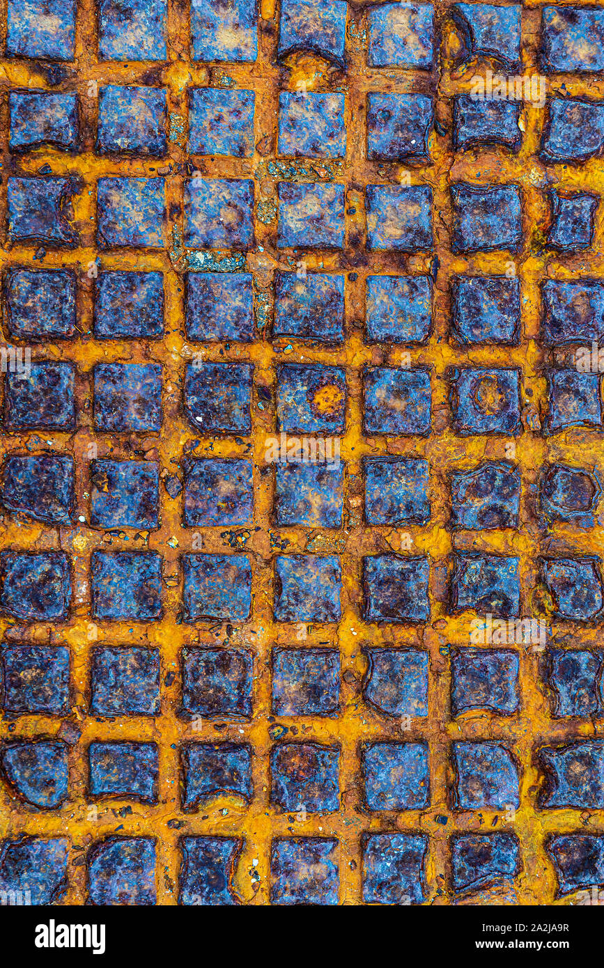 Old rusty metal surface with square shapes as background Stock Photo ...