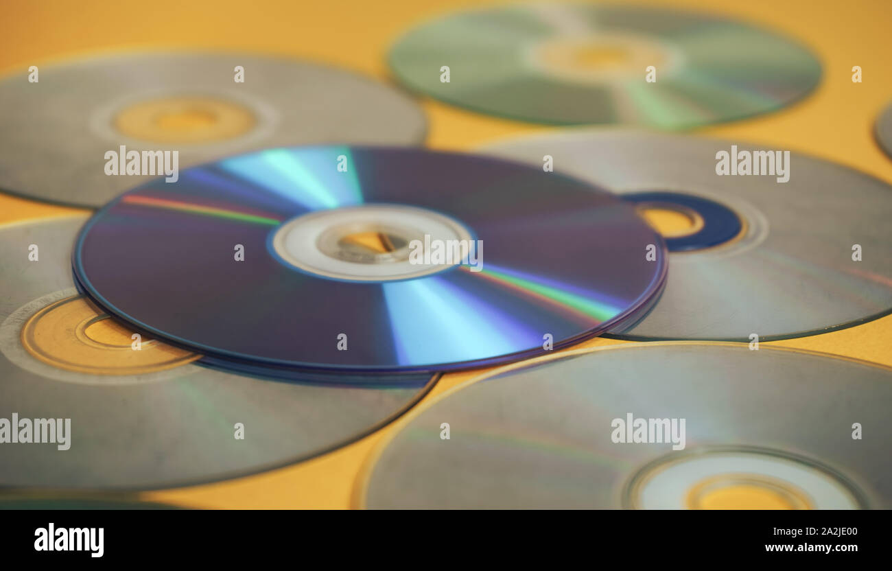 Close up Beautiful Old dirty CDs,DVD on yellow background Stock Photo ...