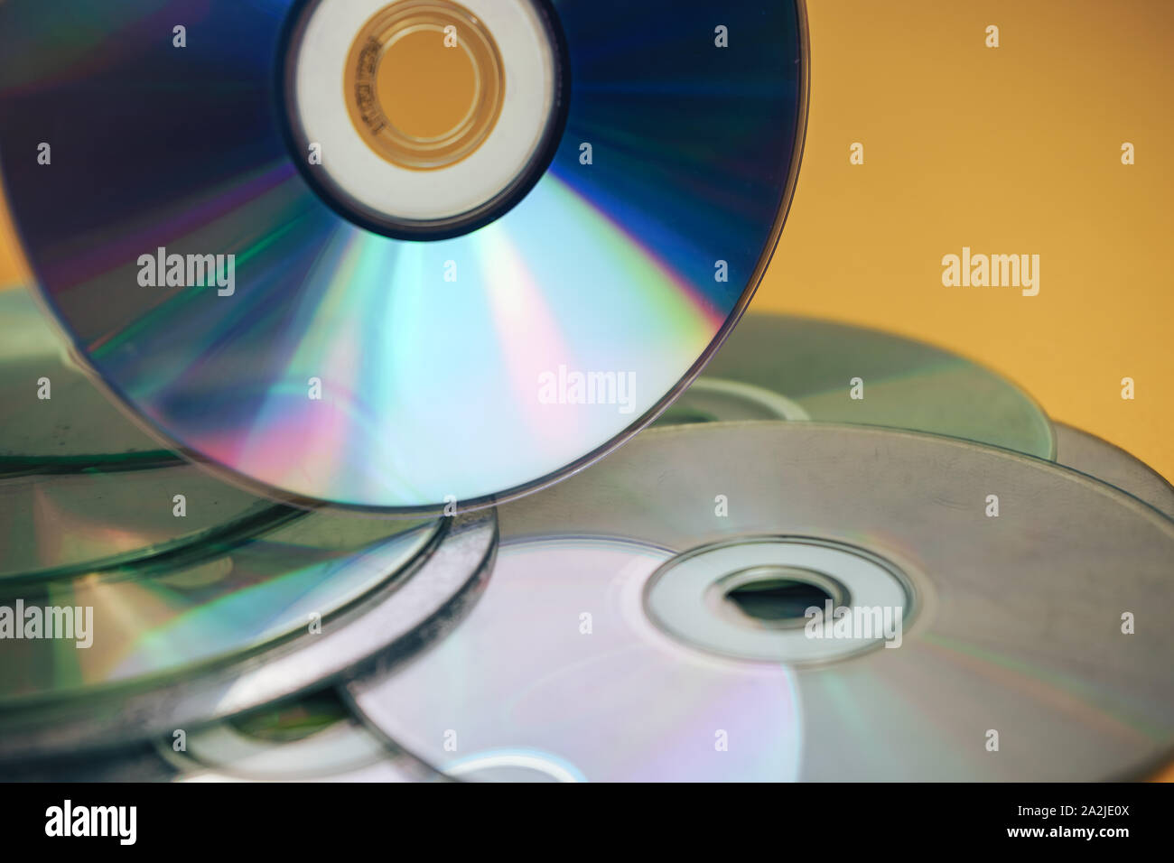 Close up Beautiful Old dirty CDs,DVD on yellow background Stock Photo ...