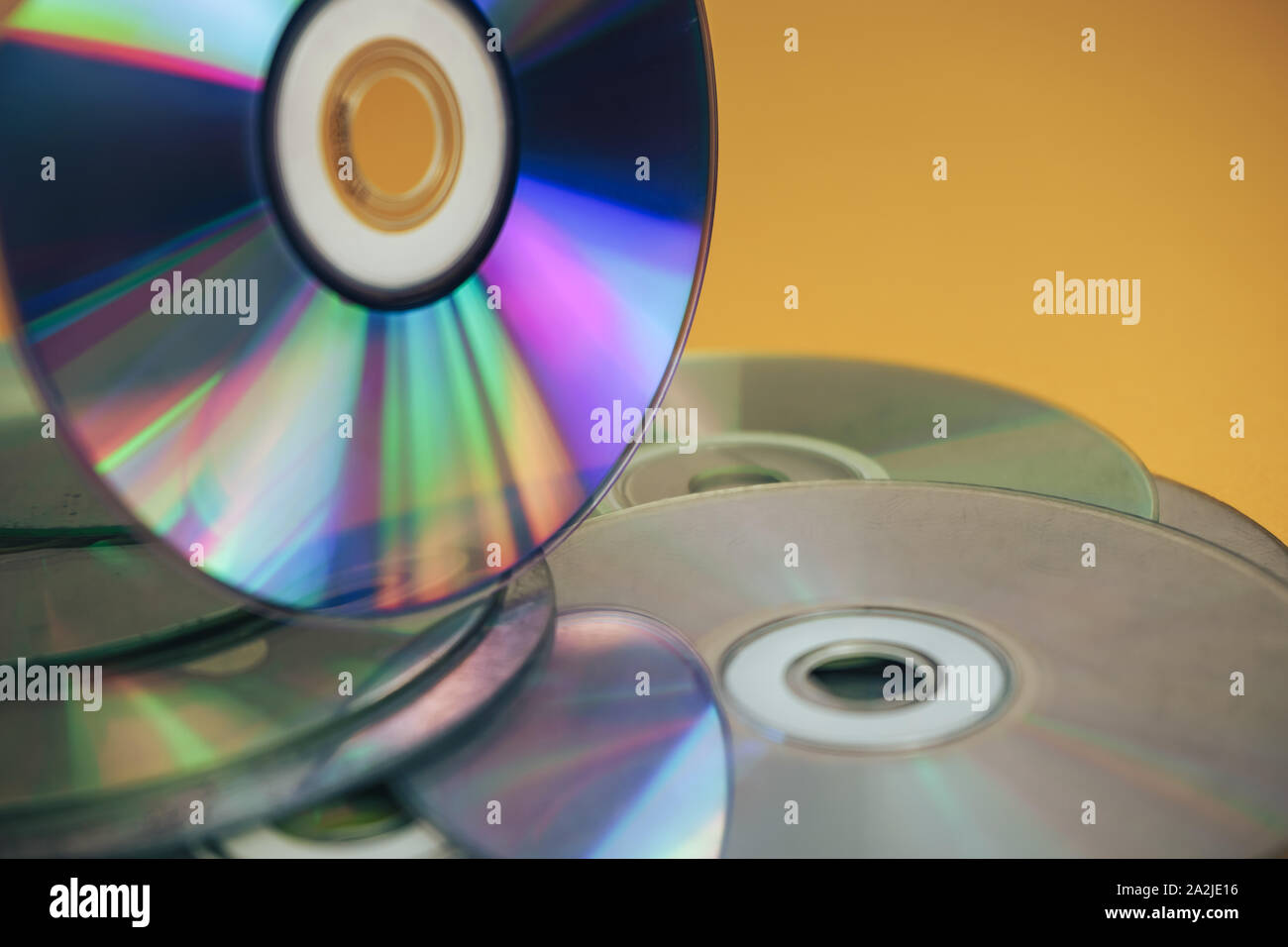 Close up Beautiful Old dirty CDs,DVD on yellow background Stock Photo ...