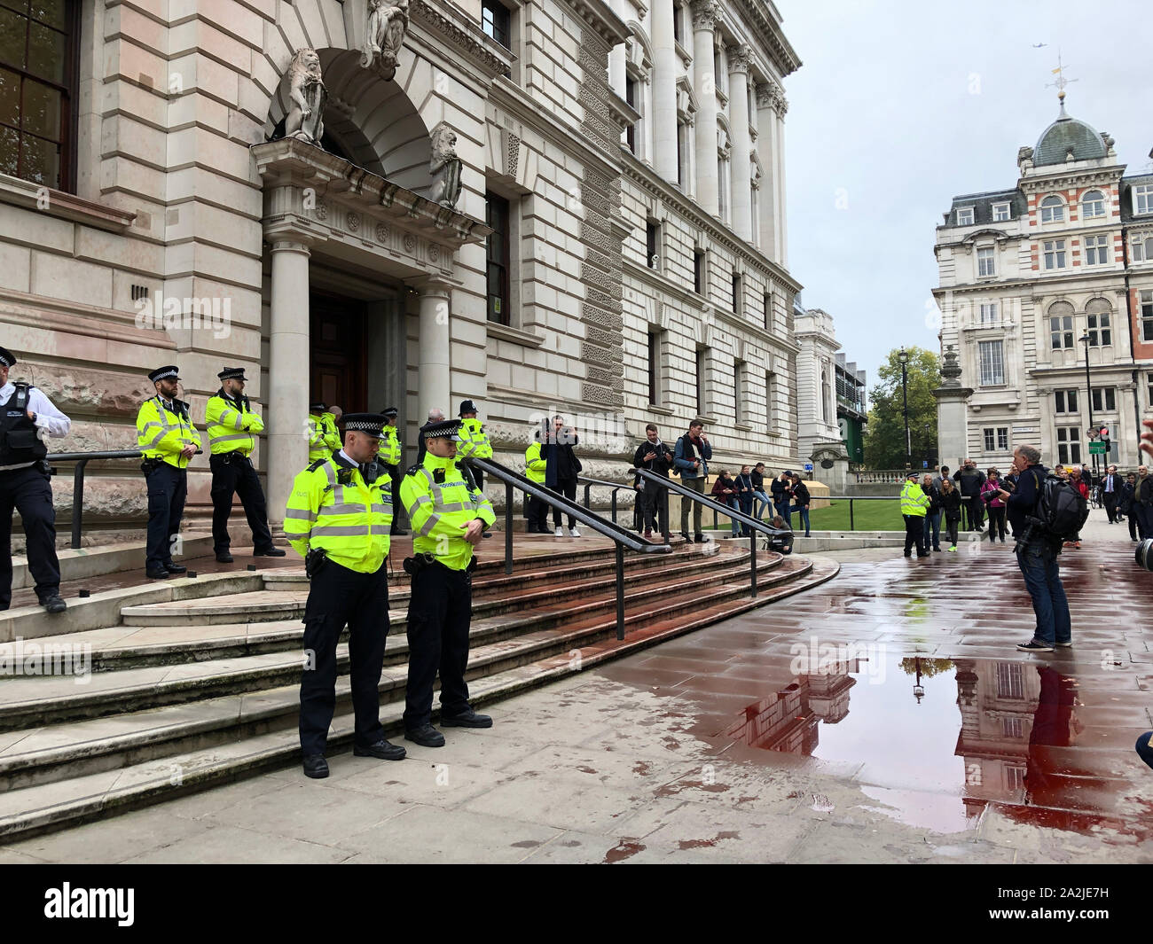 Police officers outside the Treasury building in Westminster, where ... Police officers outside the Treasury building in Westminster, where ...