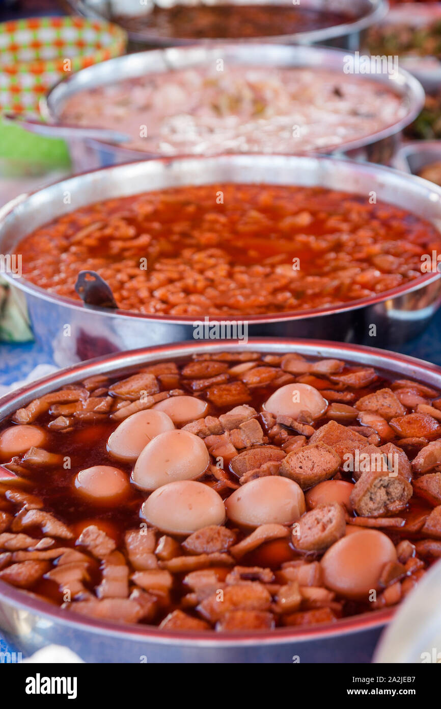 Traditional Lao cuisine ready to eat at local street market, Pakse ...