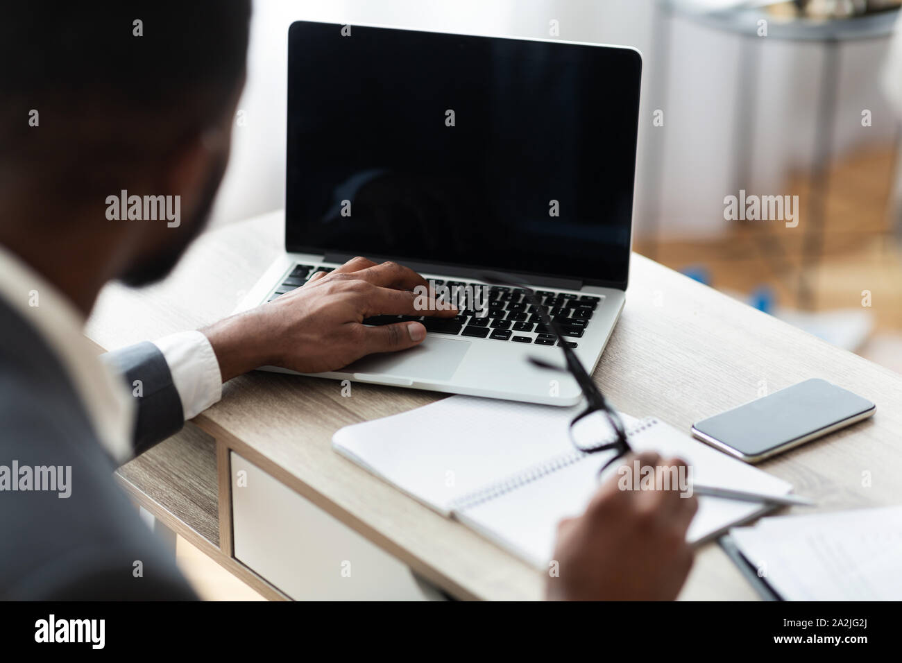 Closeup serious man working laptop hi-res stock photography and images ...