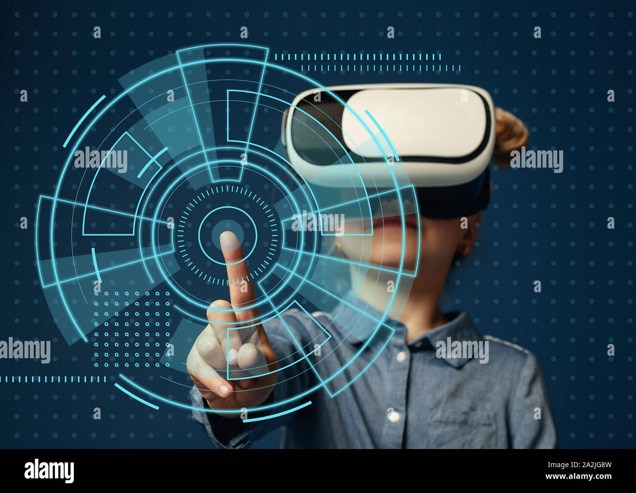 Modern technologies. Little caucasian girl's touching virtual reality ...