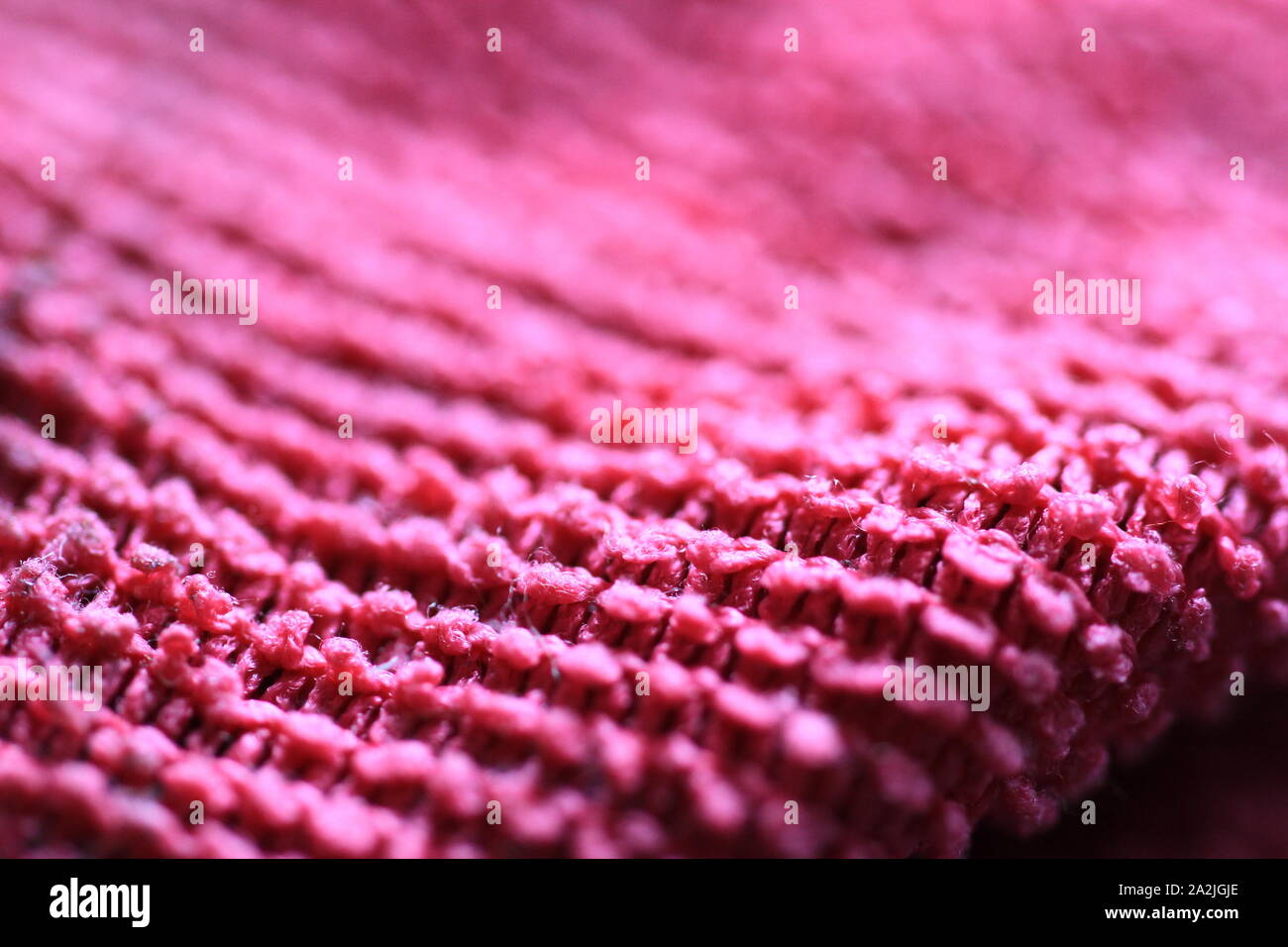 Pink microfiber fabric surface under macro lens Stock Photo - Alamy