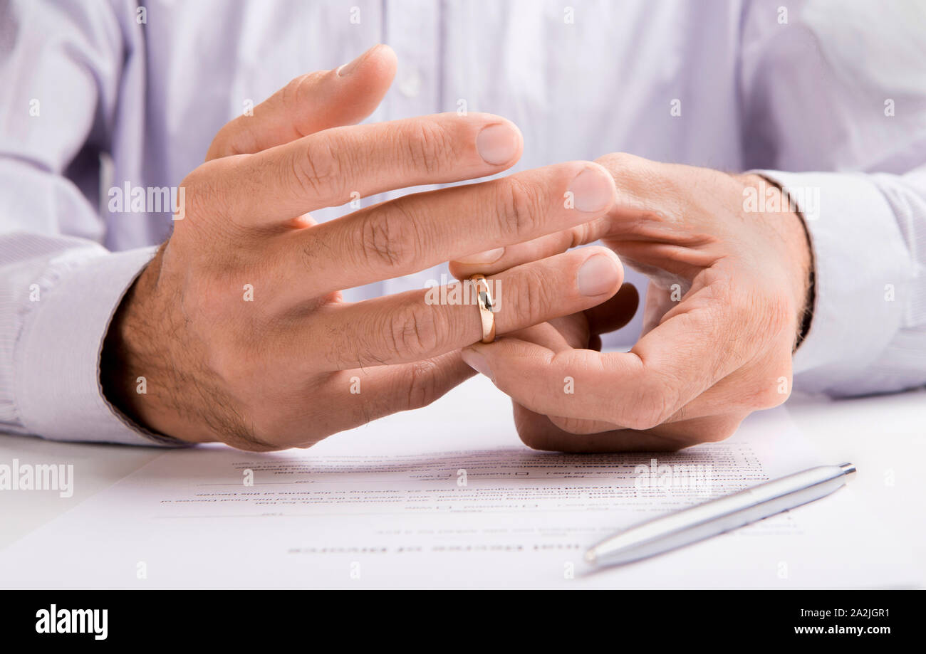 Remove wedding ring suit hi-res stock photography and images - Alamy