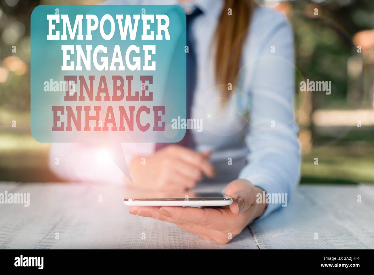 Writing note showing Empower Engage Enable Enhance. Business concept ...