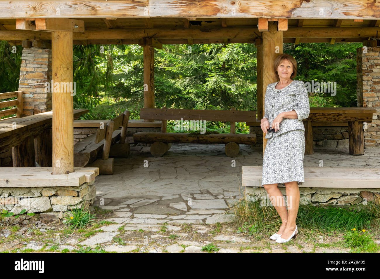 Attractive senior lady in the park. Healthy and active lifestyle ...