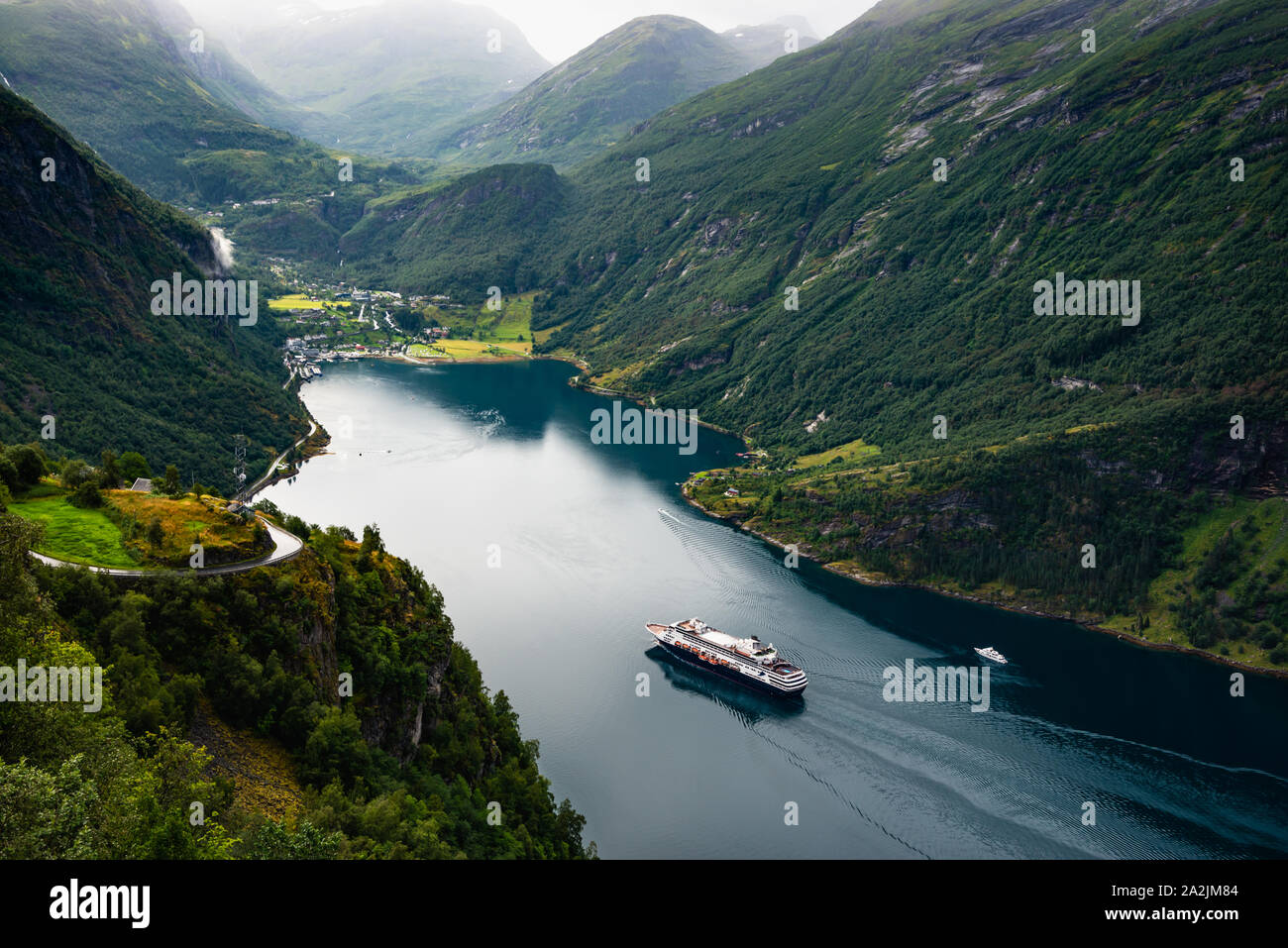 Fjord Geirangerfjord with cruise ship, view from Ornesvingen viewing ...