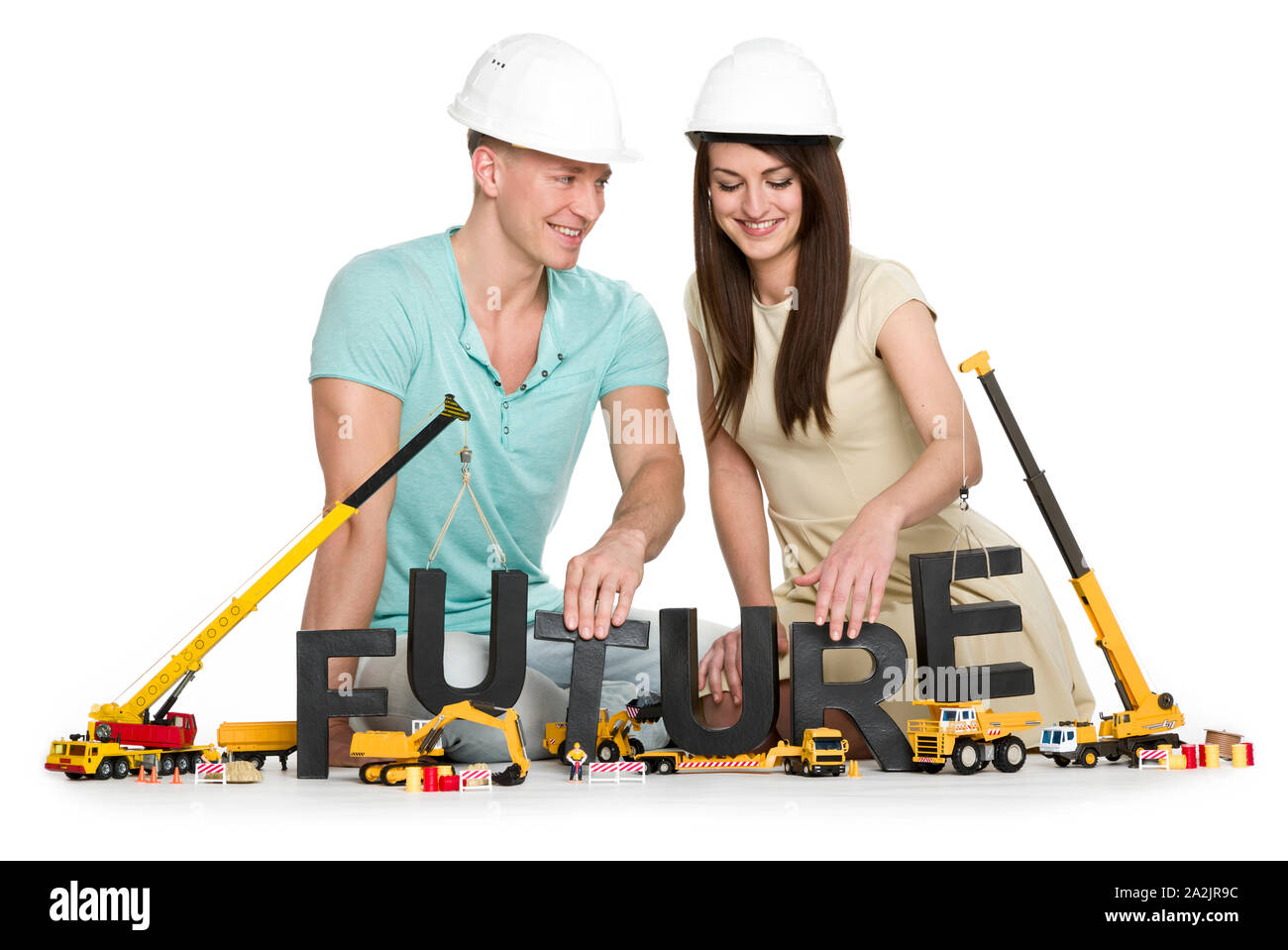 Happy smiling man and woman building up their future Stock Photo - Alamy