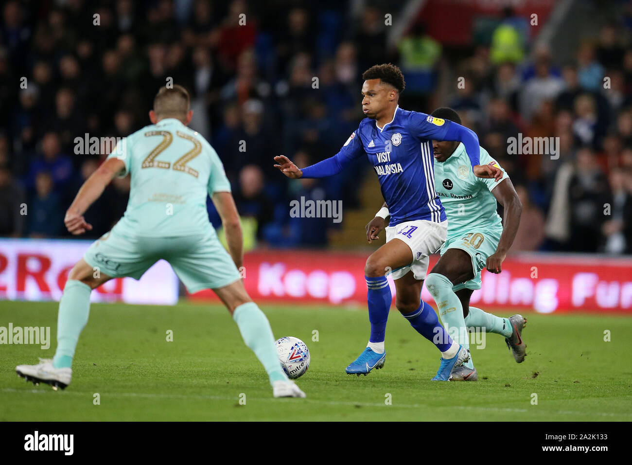 Cardiff, UK. 02nd Oct, 2019. Josh Murphy of Cardiff City (m) makes a ...