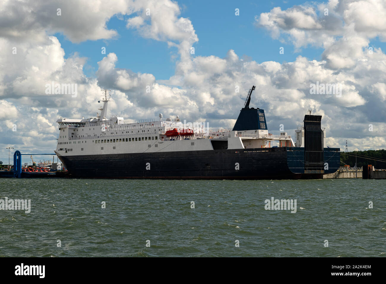 Big freighter or cruise ship loading at the harbor. Industrial ...
