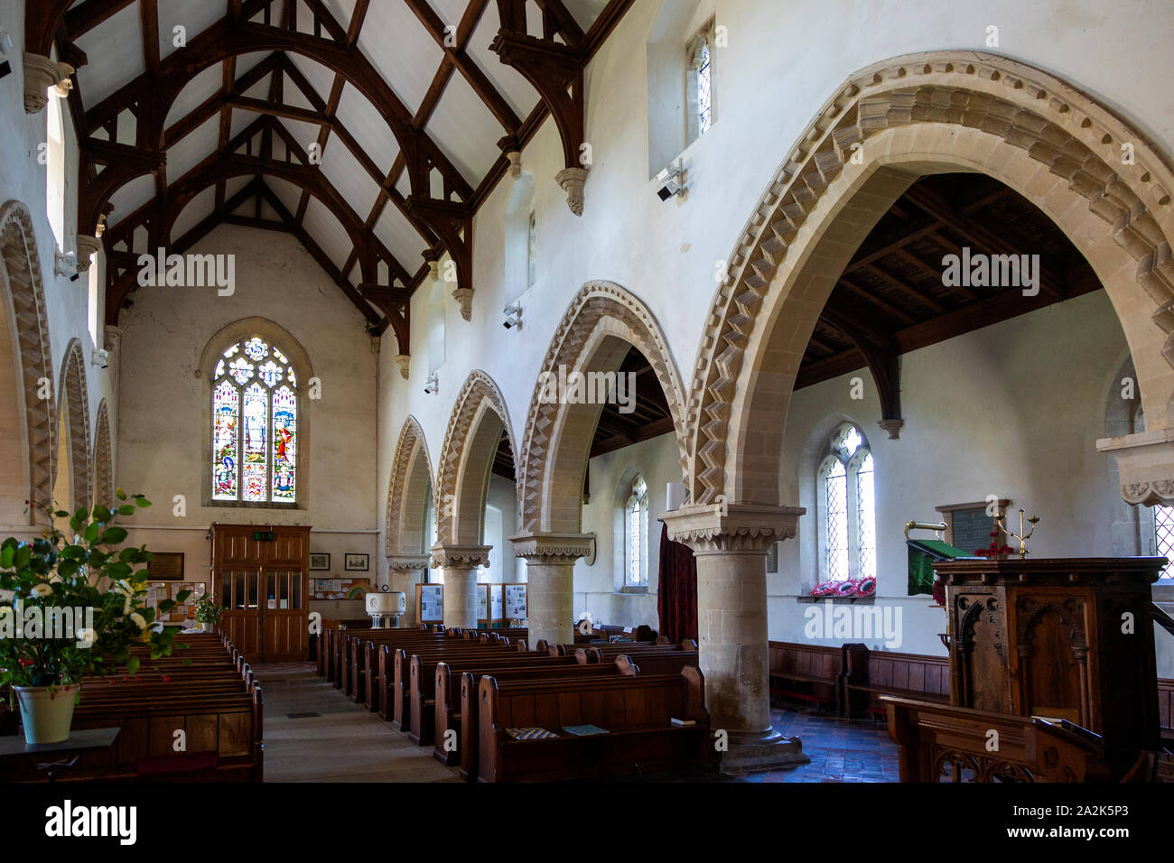 Decorated Norman arches in nave of Great Bedwyn church, Wiltshire ...