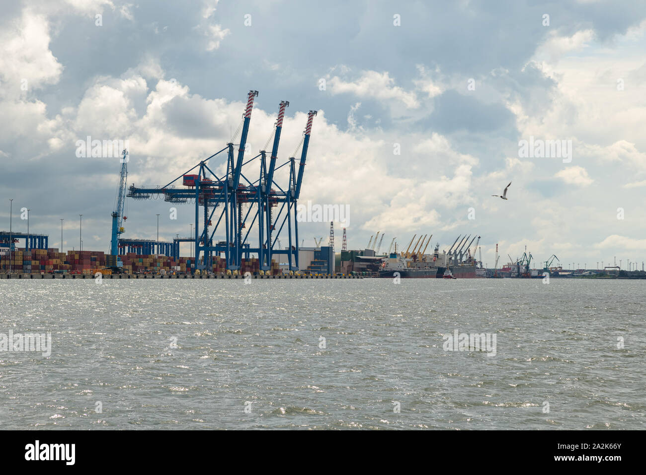 Ccommercial container port for loading and unloading freighter ships ...