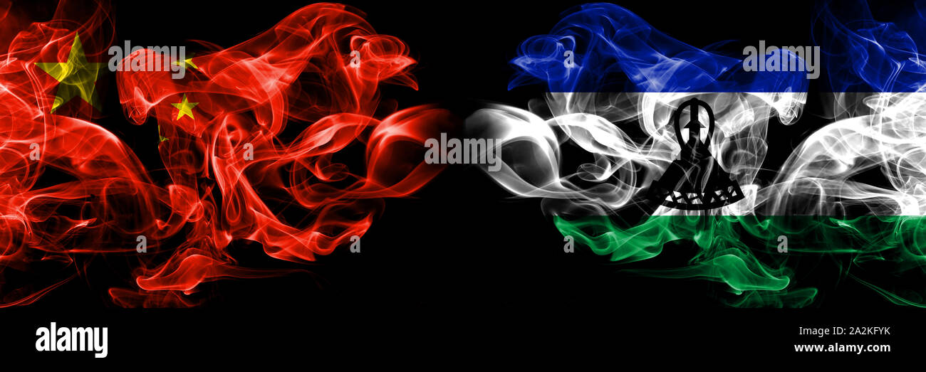China vs Lesotho smoke flags placed side by side. Thick colored silky ...