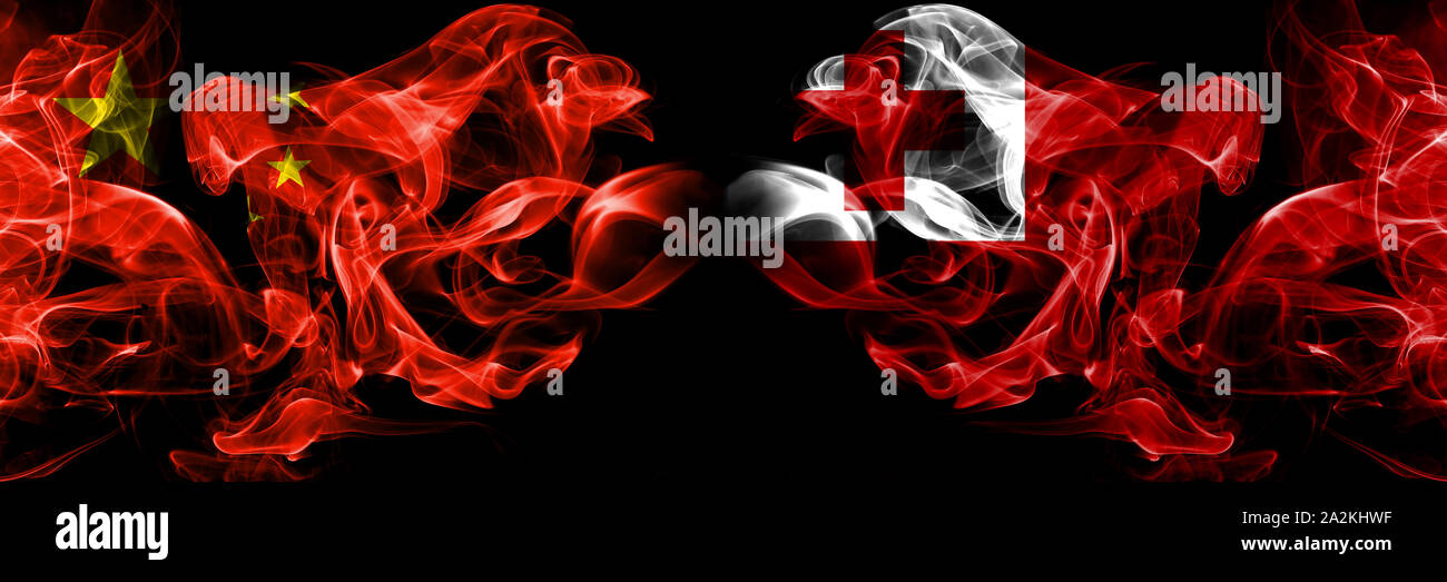 China vs Tonga, Tongan smoke flags placed side by side. Thick colored ...