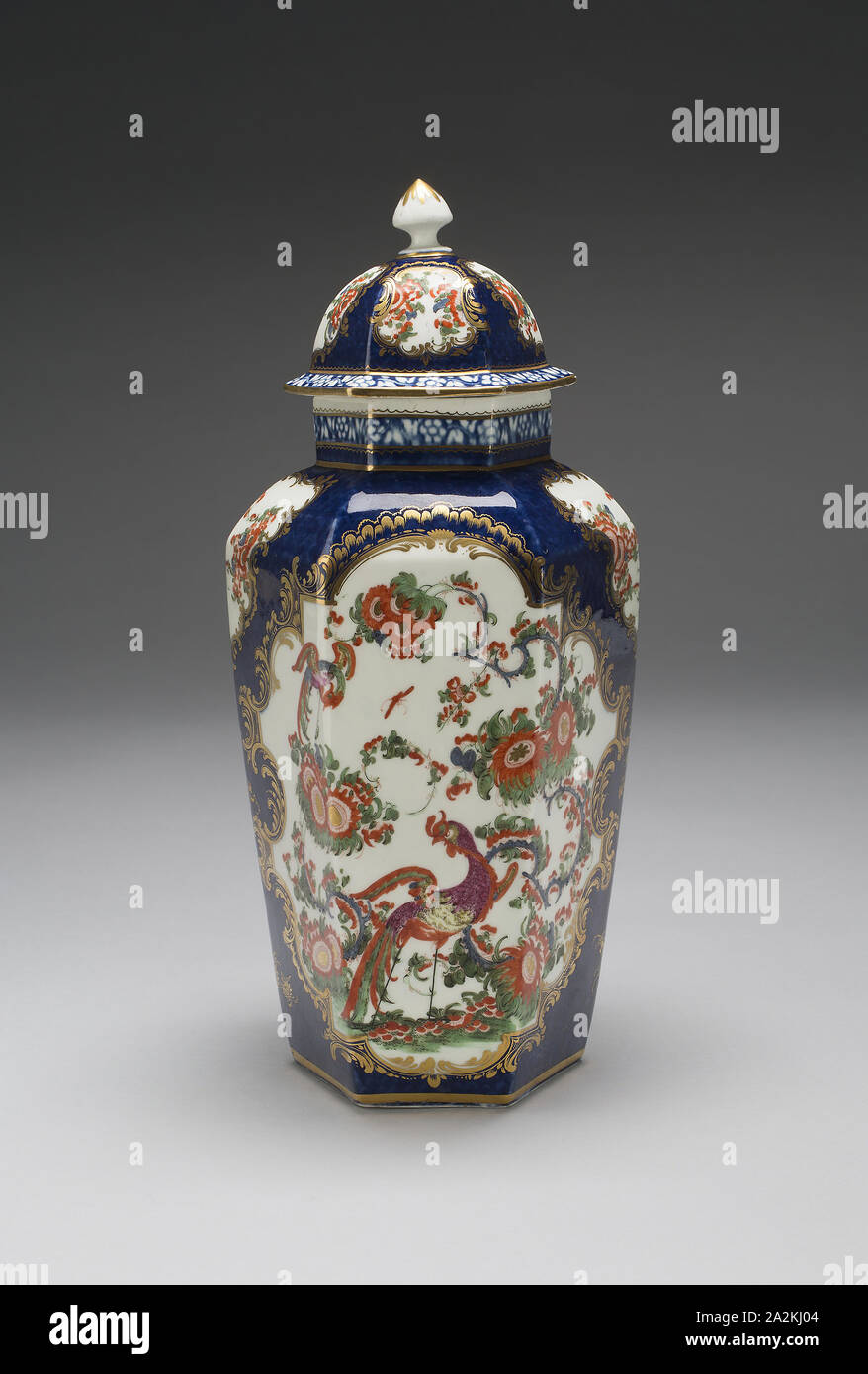 Soft paste porcelain with blue scale ground and gilding hi-res stock ...