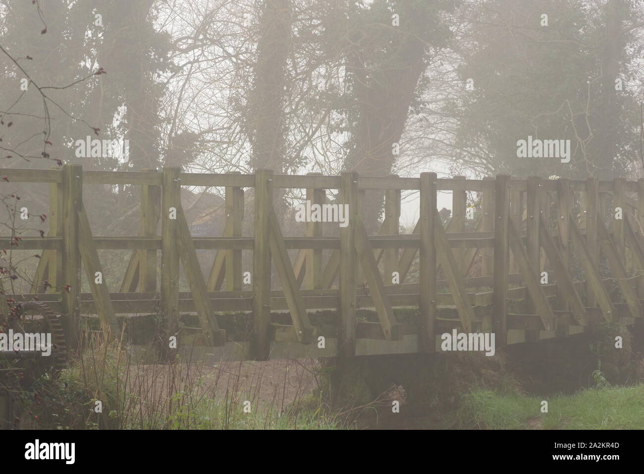 Wooden Mill Pedestrian Leat Bridge on a Misty Winters Day. Exeter ...